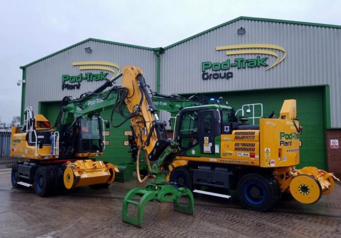 pod-trak-building-signs-and-excavators - Signs Northwest